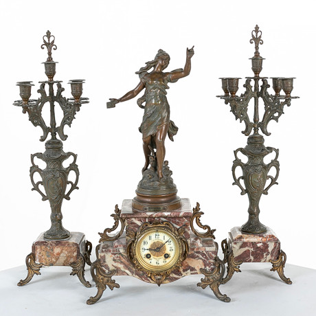 A table clock with candelabra, marked Auguste Moreau, early 1900 ...