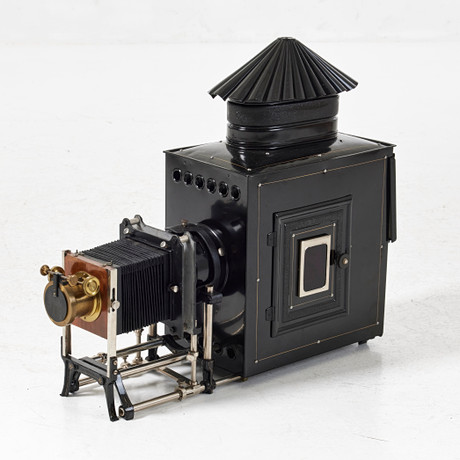 PROJECTOR, laterna magica, circa 1910s/1920s, black lacquered steel and ...