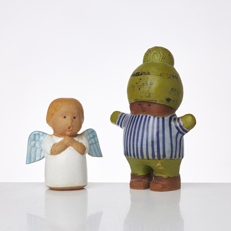 LISA LARSON. 2 dlr., Figurine “Donald”, and candlestick in the shape of ...