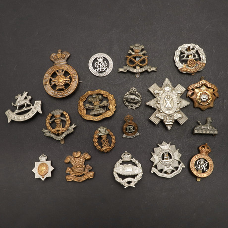 A COLLECTION OF CAP BADGES AND OTHERS SIMILAR. Weapons & Militaria ...