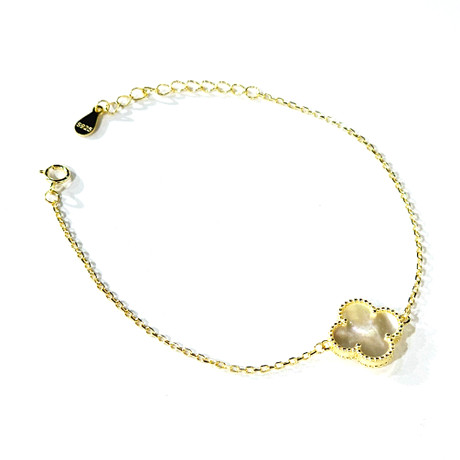 Bracelet in golden silver with mother-of-pearl center. Following Van ...