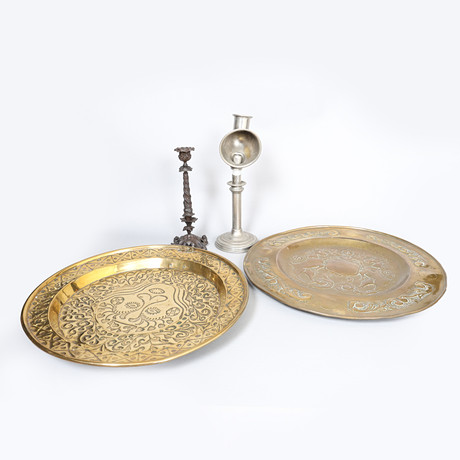 TWO BRASS CHARGERS TOGETHER WITH TWO CANDLESTICKS (4). Silver & Metals ...