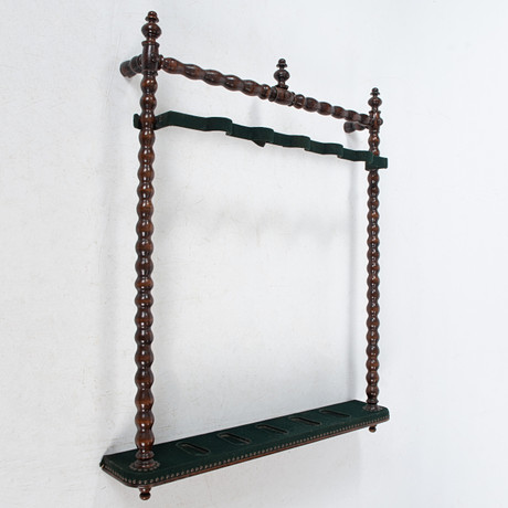 A baroque style gun rack, turned posts and green velvet, 18th/20th ...