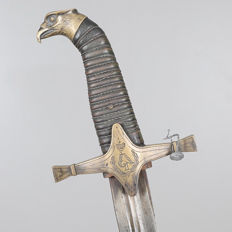A COPY OF A 19TH CENTURY RUSSIAN SWORD AND SCABBARD. Weapons ...