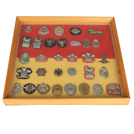 A FRAMED COLLECTION OF BRITISH MILITARY BADGES. Coins, Medals & Stamps ...