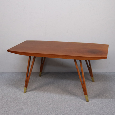 A teak coffee table with brass ends on legs, 1960/70s. Furniture ...