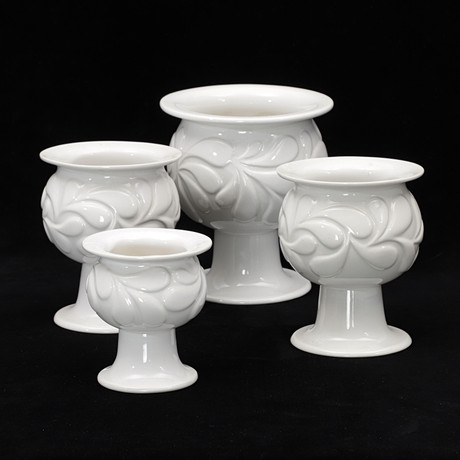 A set of four ceramic “Leaf relief” outer lining by Margareta Hennix ...