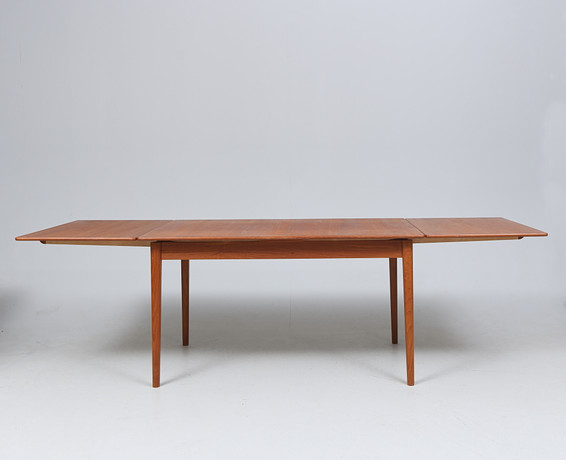 NILS JONSSON. A teak “Bjärni” dining table with pull-out plates, Hugo ...