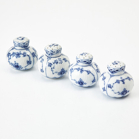 ROYAL COPENHAGEN, a set of four “Musselmalet” salt and pepper pots ...