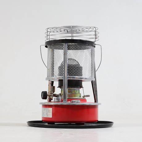 A metal Fuji kerosene heater, 20th century. Miscellaneous ...
