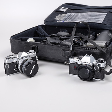 Camera equipment, Olympus OM-1 and OM-10 and lenses, second half of the ...