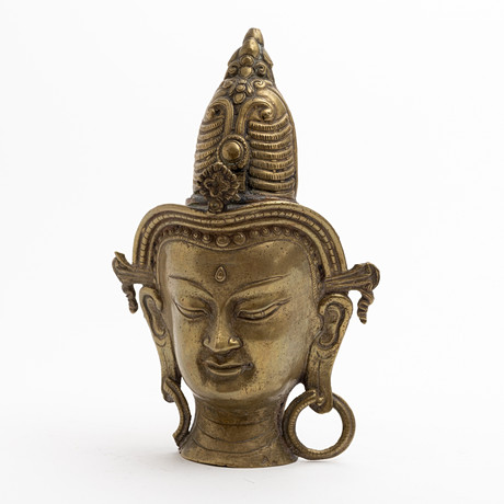 DEITY. “Tara's Head”, brass, Southeast Asia, 20th century. Silver ...