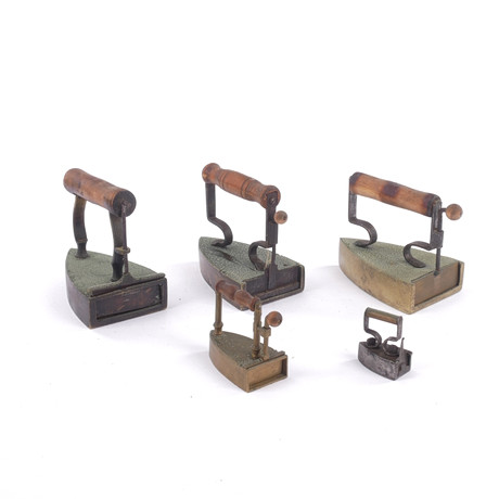 A set of 5 brass and iron soldering irons, blue miniature irons, 18th ...