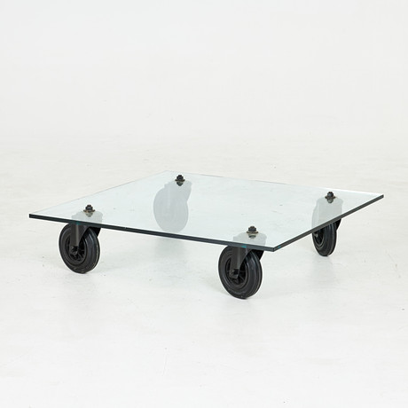 GAE AULENTI. “Tavolo Con Ruote “, coffee table, for FontanaArte, glass ...