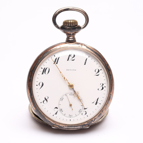 A silver Zenith pocket watch, first half of the 20th century. Clocks ...