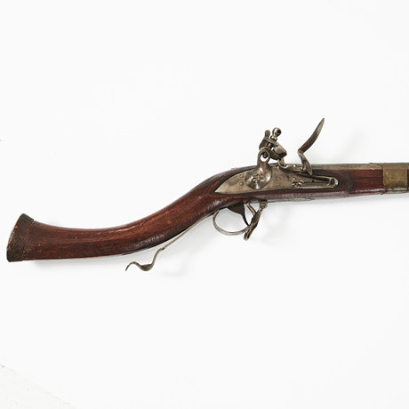 A JEZAIL, with British flint clasp, Central Asia, 19th century. Weapons ...