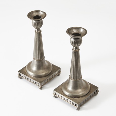 A pair of Gustavian style candlesticks, first half of the 20th century ...