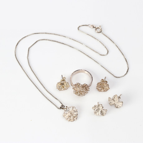 FLORA DANICA, JEWELRY, FOUR PIECES. Silver-plated metal-clad plant ...