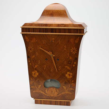 A 1940s/50s intarsia wall clock. Clocks & Watches - Wall Clocks - Auctionet