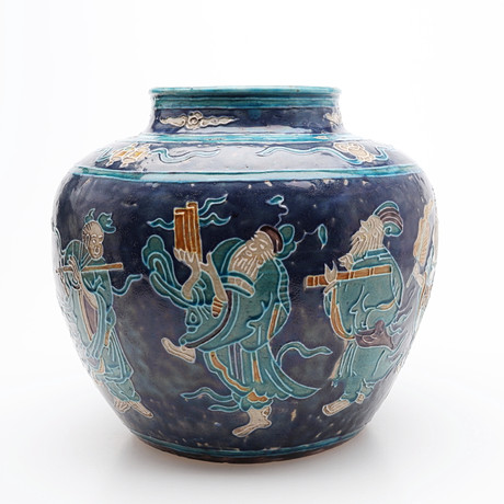 A Chinese fahua-ware urn, glazed with the motif of the eight immortals ...