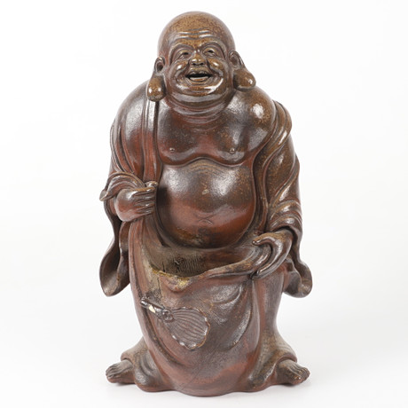 A sculpture of a laughing Buddha, salt-glazed ceramic, 20th century ...