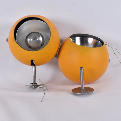 EJNER GRAAE & HENNING HELGER. A pair of round lacquered metal wall ...