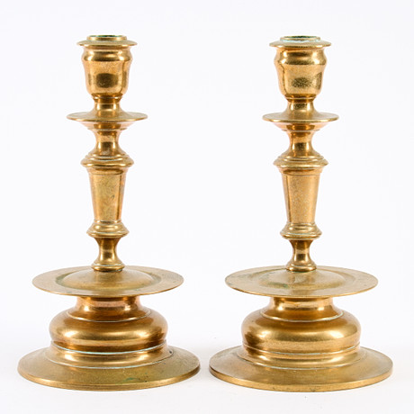 A pair of Skultuna candlesticks, model number 96. Signed. Lighting ...