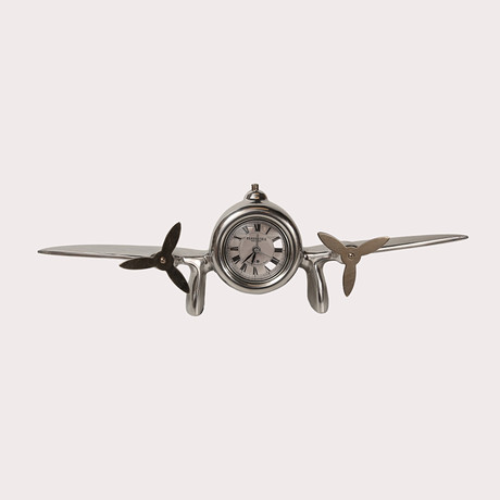 TABLE CLOCK, aluminum, in the shape of an airplane, marked Aeropostale ...