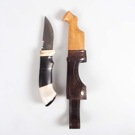 A Finnish wooden hunting knife, later part of the 20th century. Weapons ...