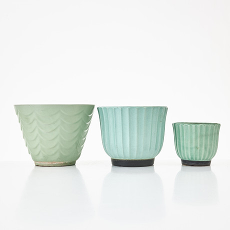 A 3-piece glazed ceramic outer lining, mid 20th century. Ceramics ...