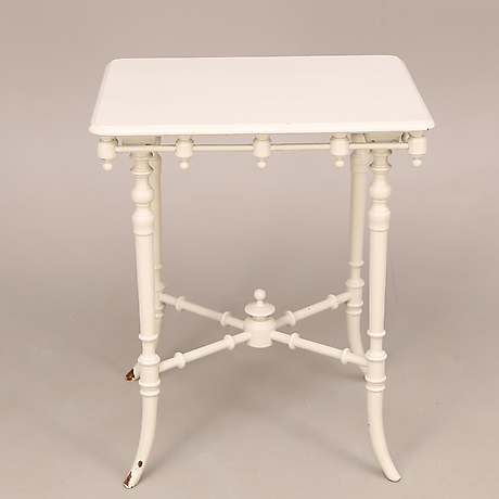 TABLE with decorative edge, white, linked legs, 1900s. Furniture ...