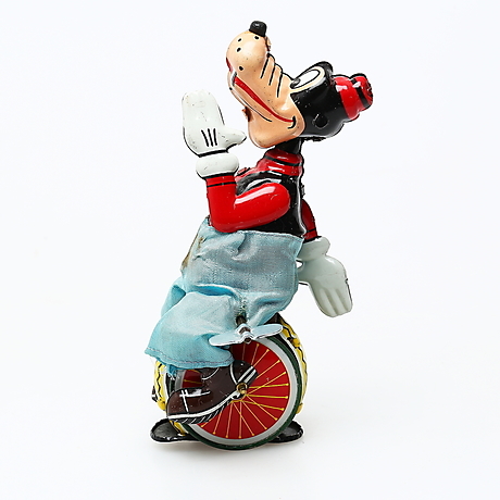 LINEMAR Goofy long legs on unicycle, clockwork. Toys - Auctionet