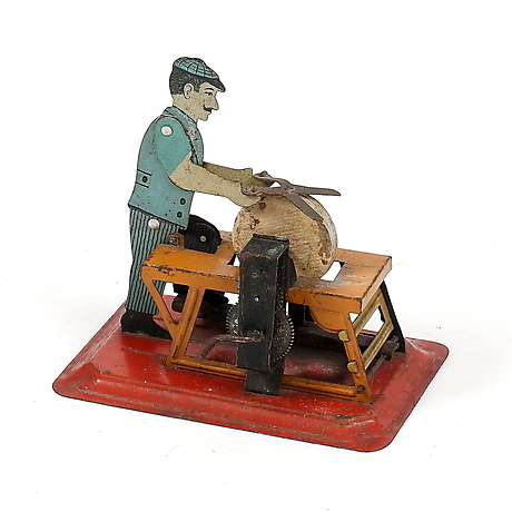 MECHANICAL TOYS, lithographed plate, man with grindstone, first part of ...