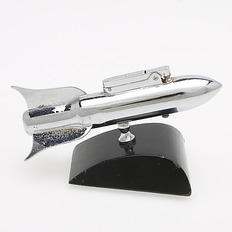 TABLE LIGHTER, in the shape of a V2 rocket, chrome plated ...