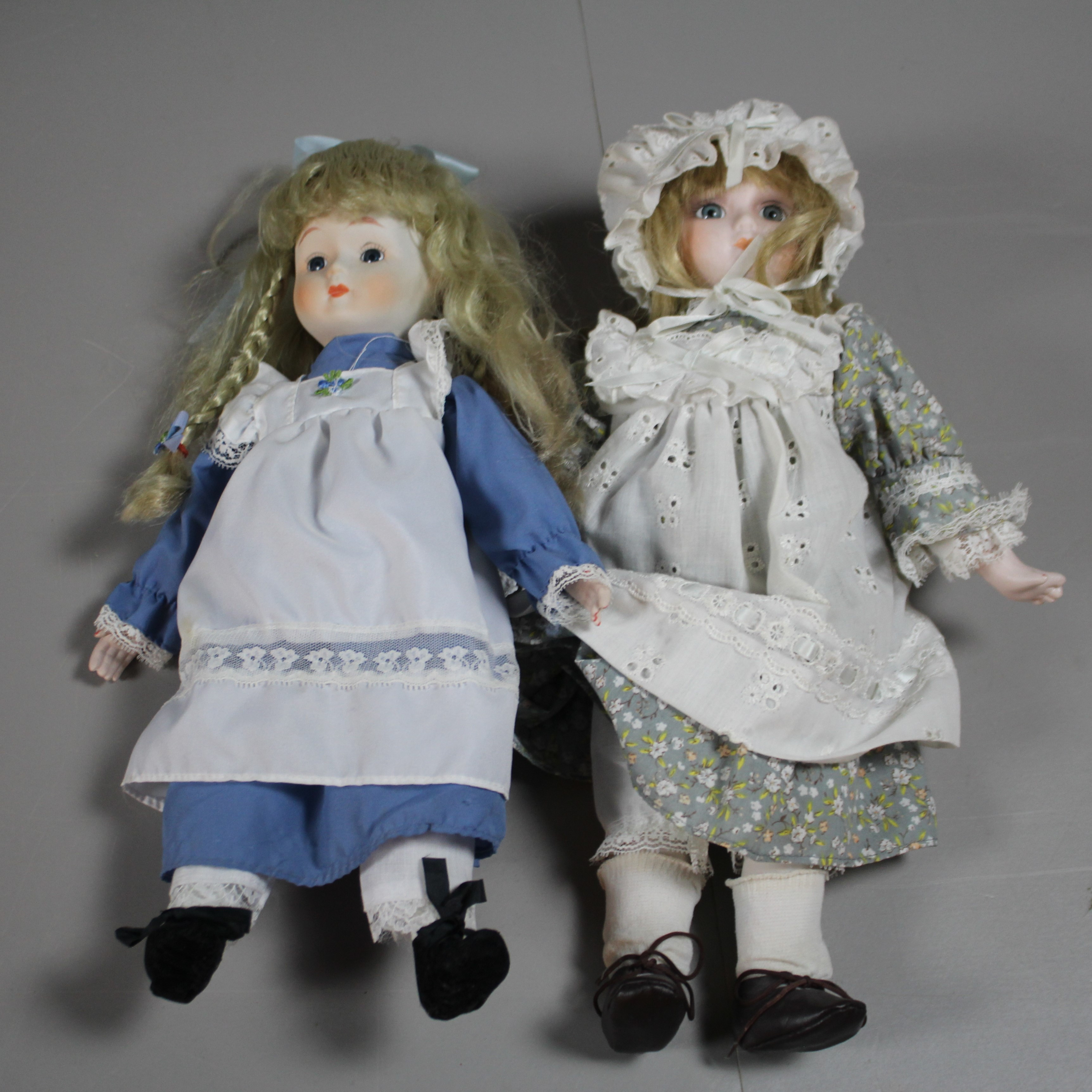 Bilder för 1293554. PORSLINSDOCKOR, 11 st samt 1 st dockvagn. - Auctionet