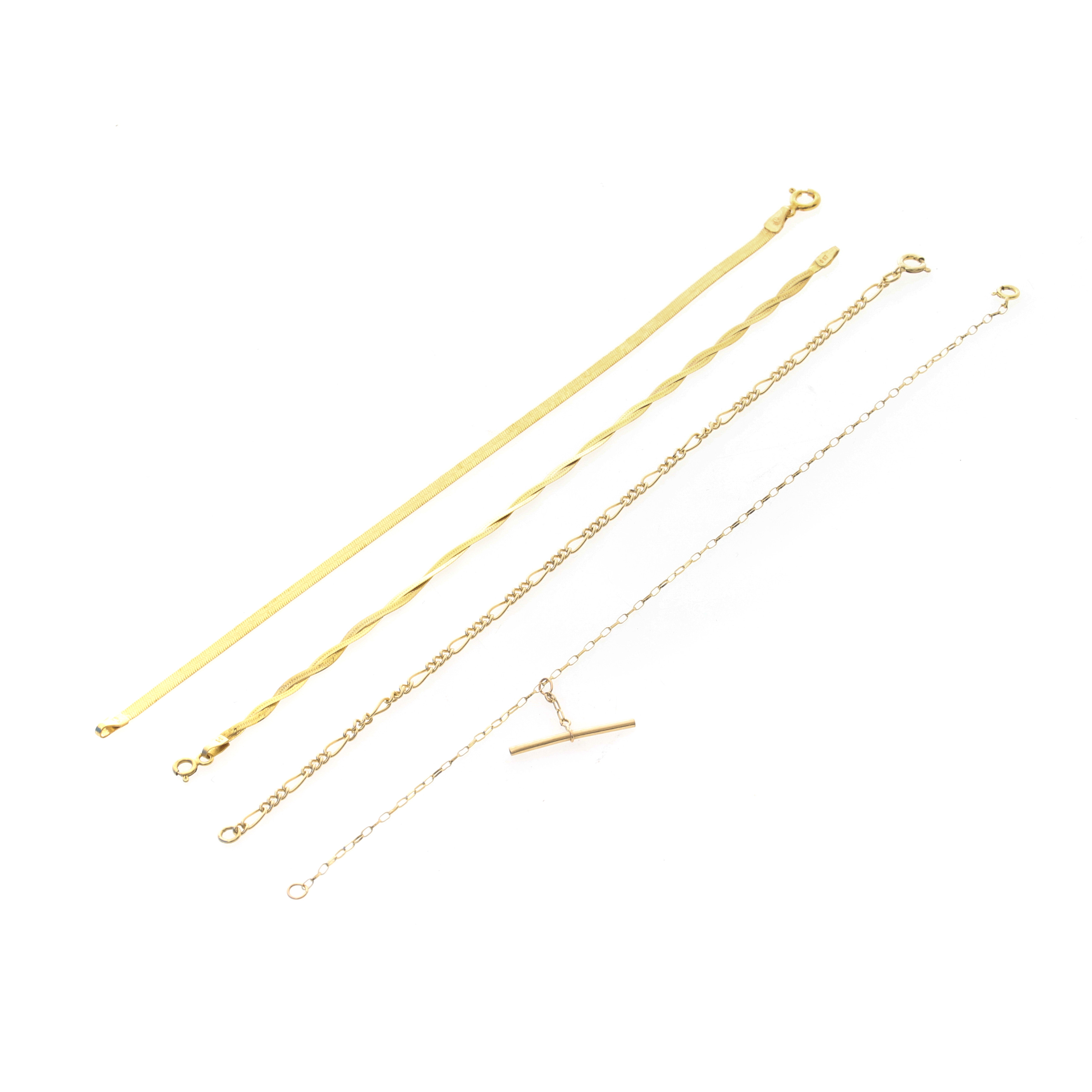 Images for 2218025. FOUR MODERN 9 CARAT AND 375 MARK GOLD BRACELETS ...