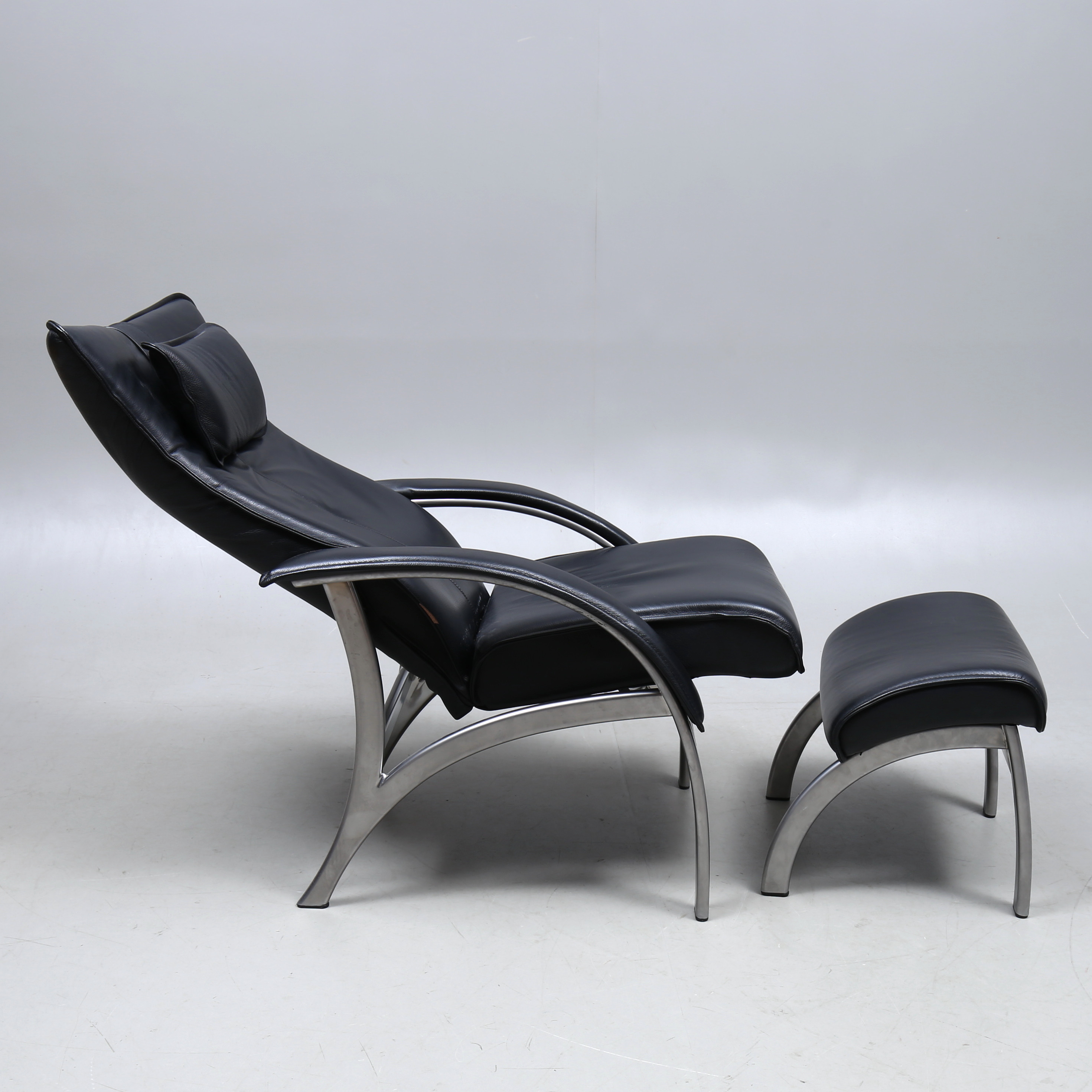 Images for 2402176. ARMCHAIR with FOOTSTOOL. Metal and Leather, "Delta ...