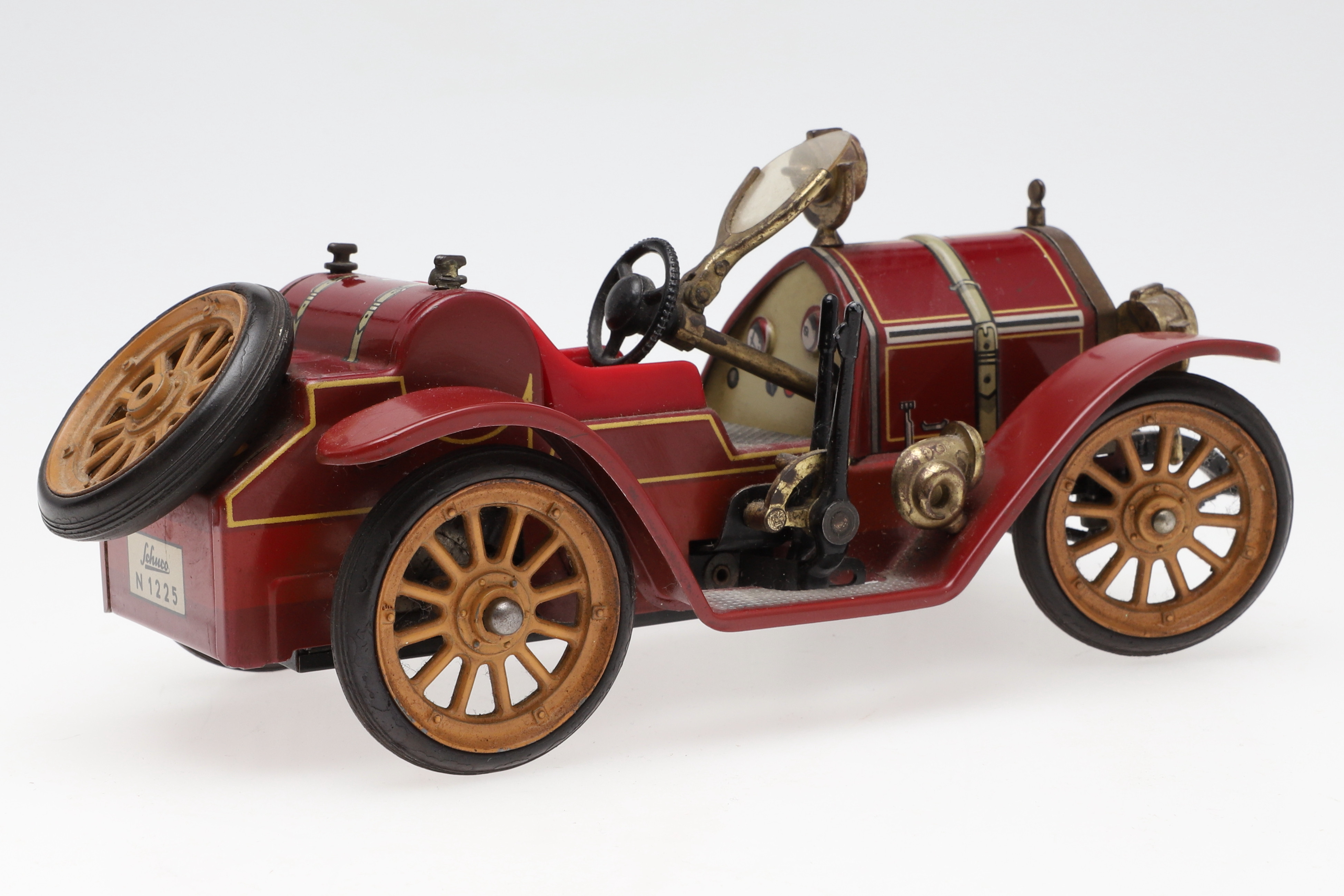 Images for 2977116. A SCHUCO TIN PLATE CLOCKWORK TOY CAR. - Auctionet
