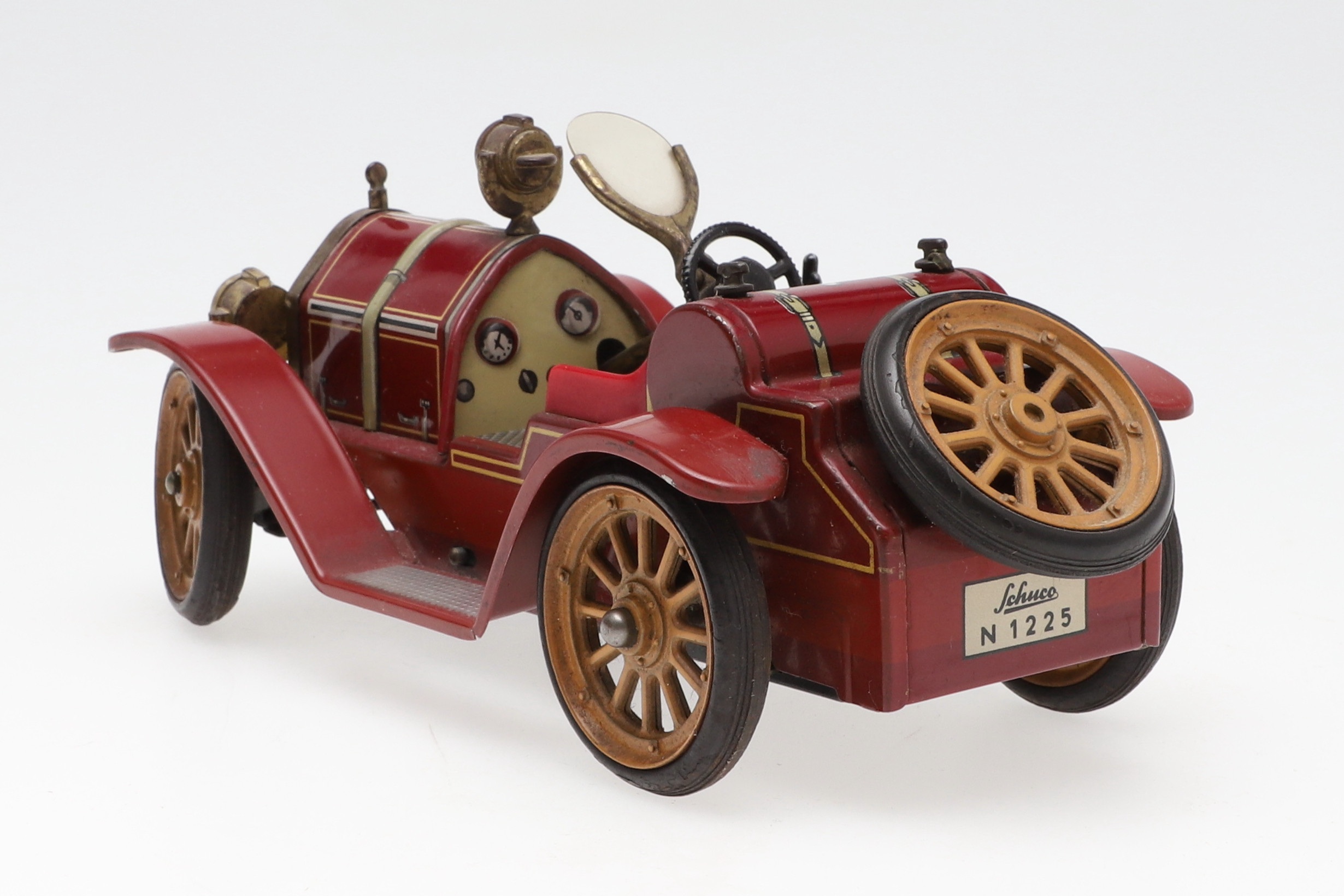 Images for 2977116. A SCHUCO TIN PLATE CLOCKWORK TOY CAR. - Auctionet