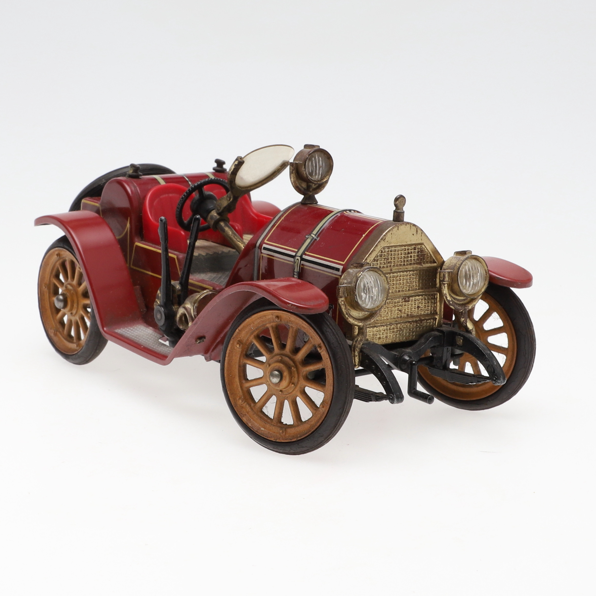 Images for 2977116. A SCHUCO TIN PLATE CLOCKWORK TOY CAR. - Auctionet