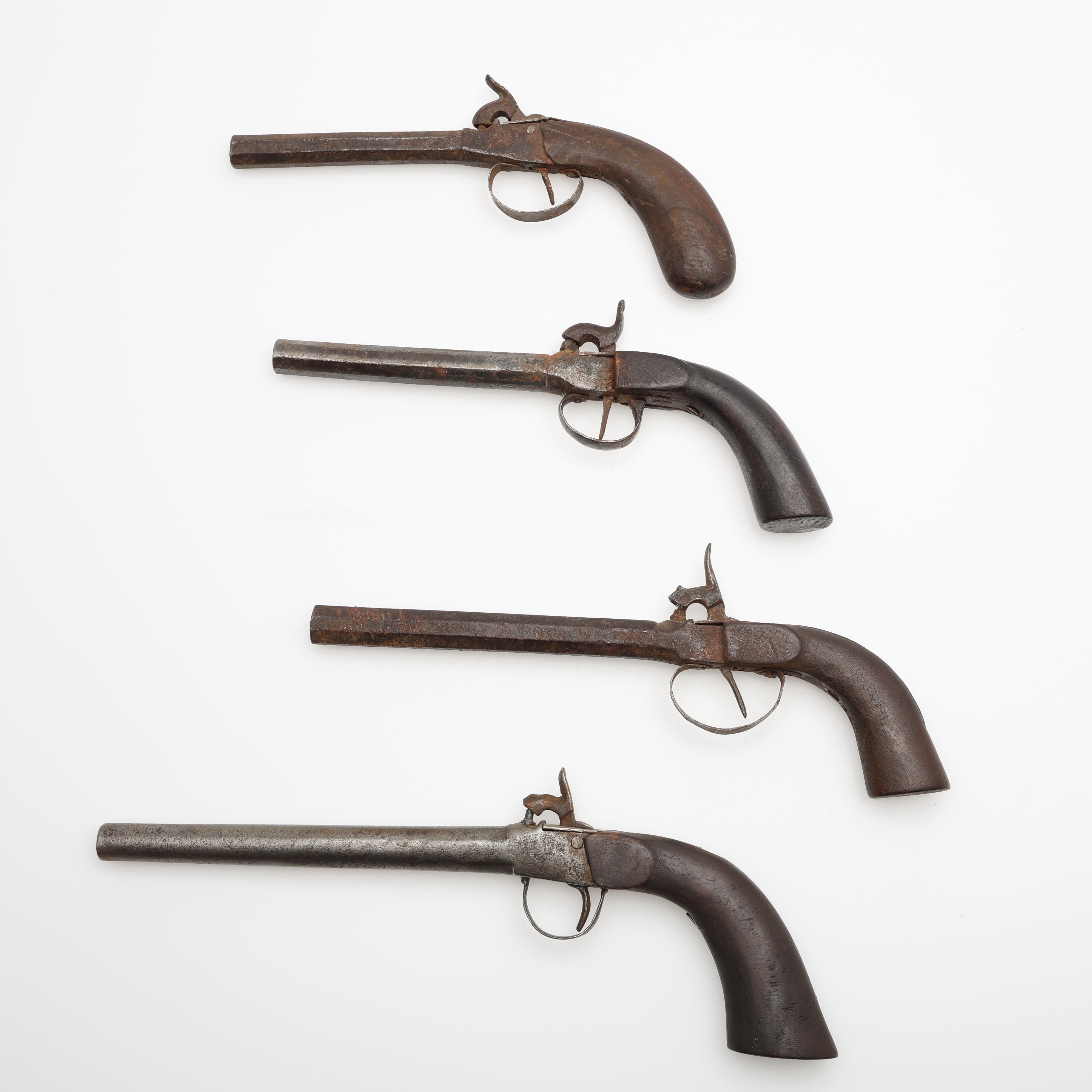 A SET OF FOUR LOCK GUNS, SO CALLED VINEYARD GUNS, MID 19TH CENTURY ...