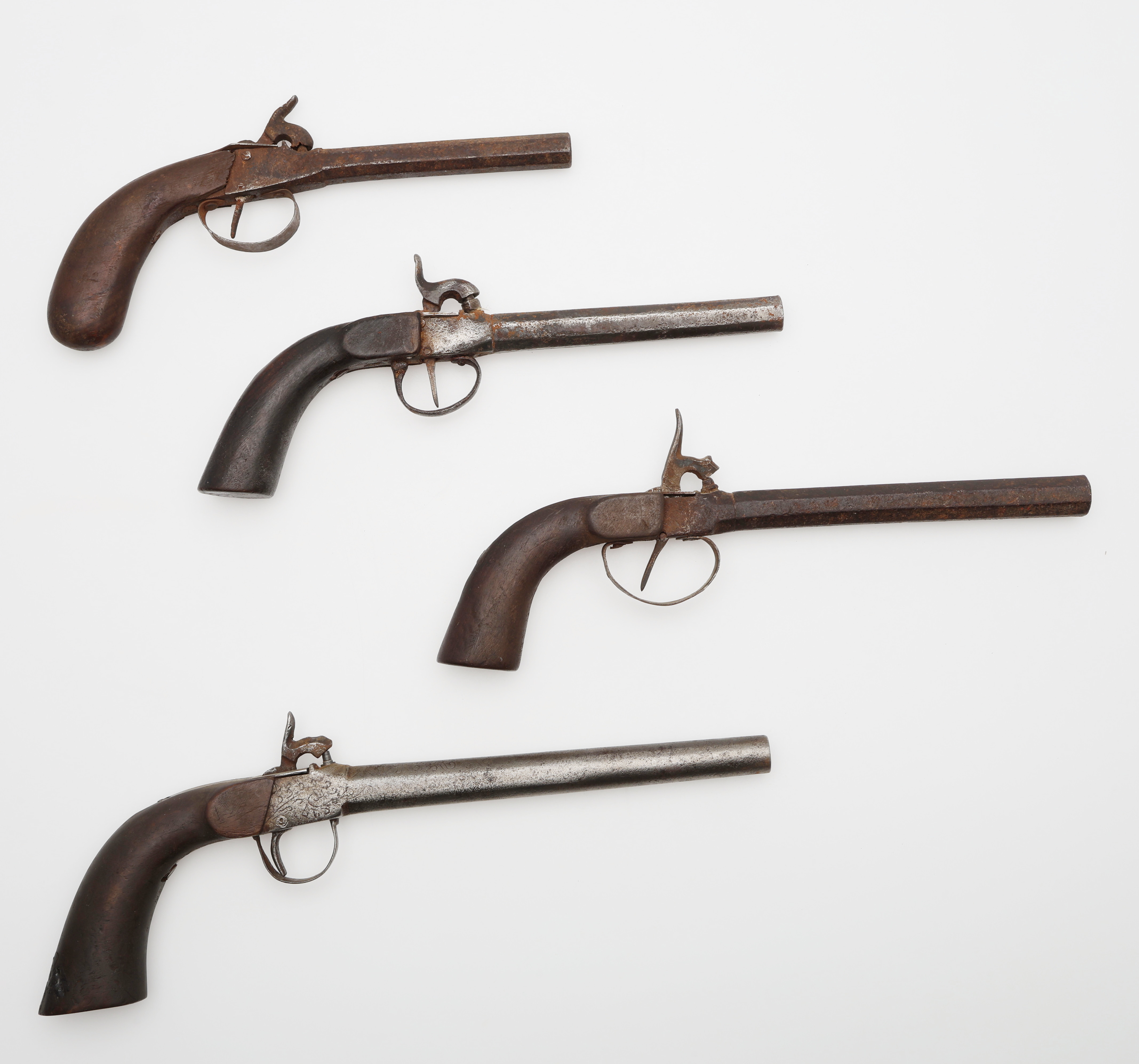 A SET OF FOUR LOCK GUNS, SO CALLED VINEYARD GUNS, MID 19TH CENTURY ...