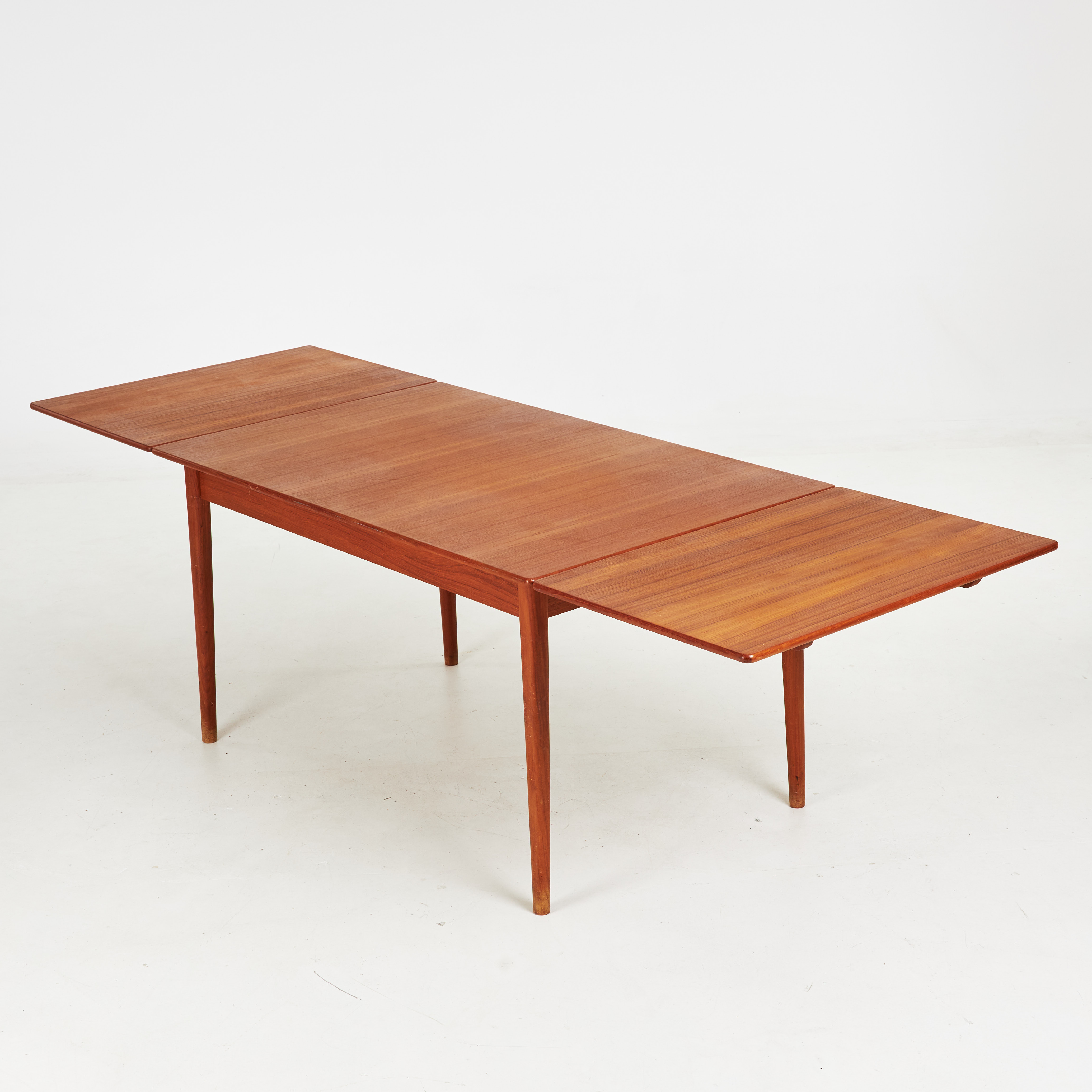 Images for 3478256. NILS JONSSON, a teak veneer dining table, with ...