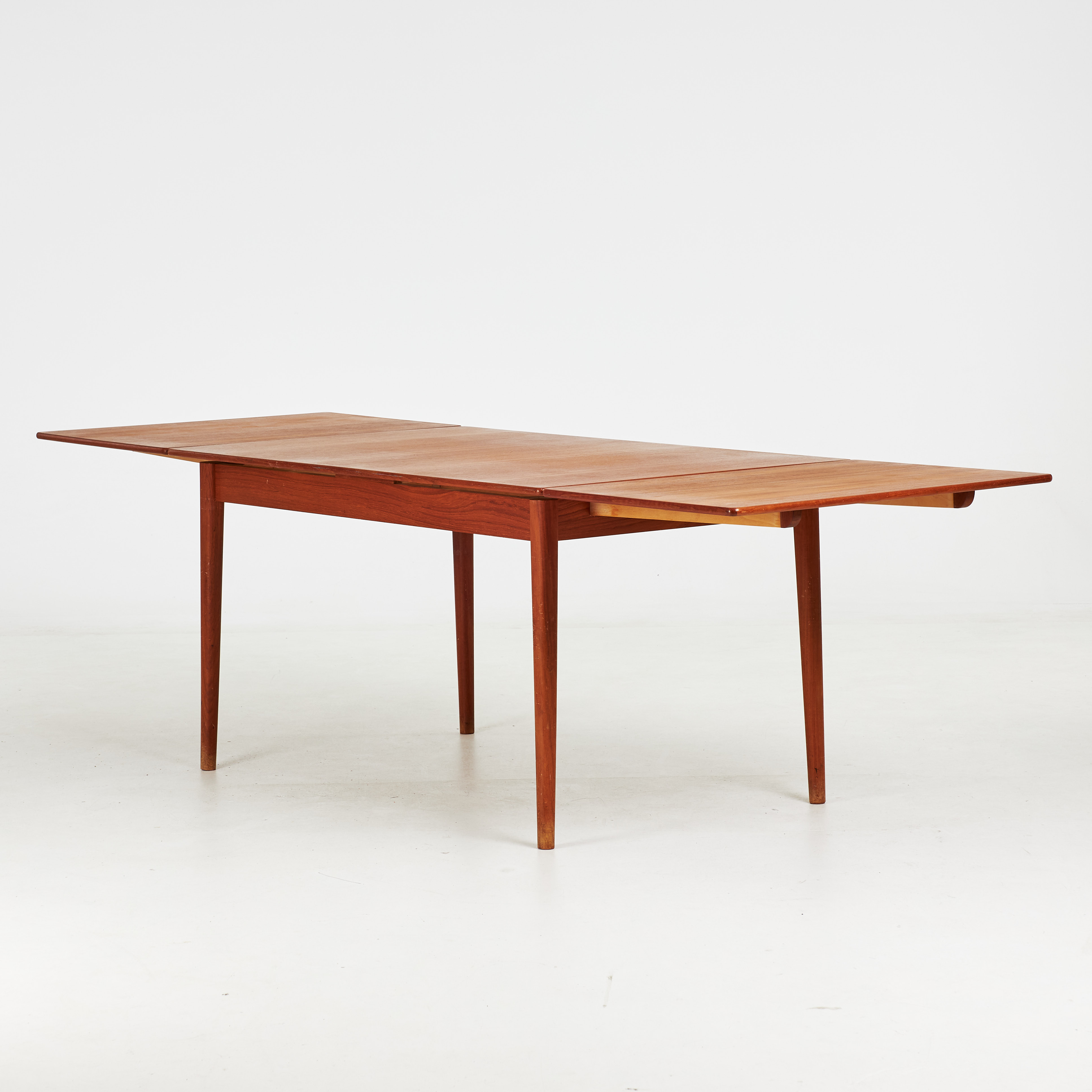 Images for 3478256. NILS JONSSON, a teak veneer dining table, with ...