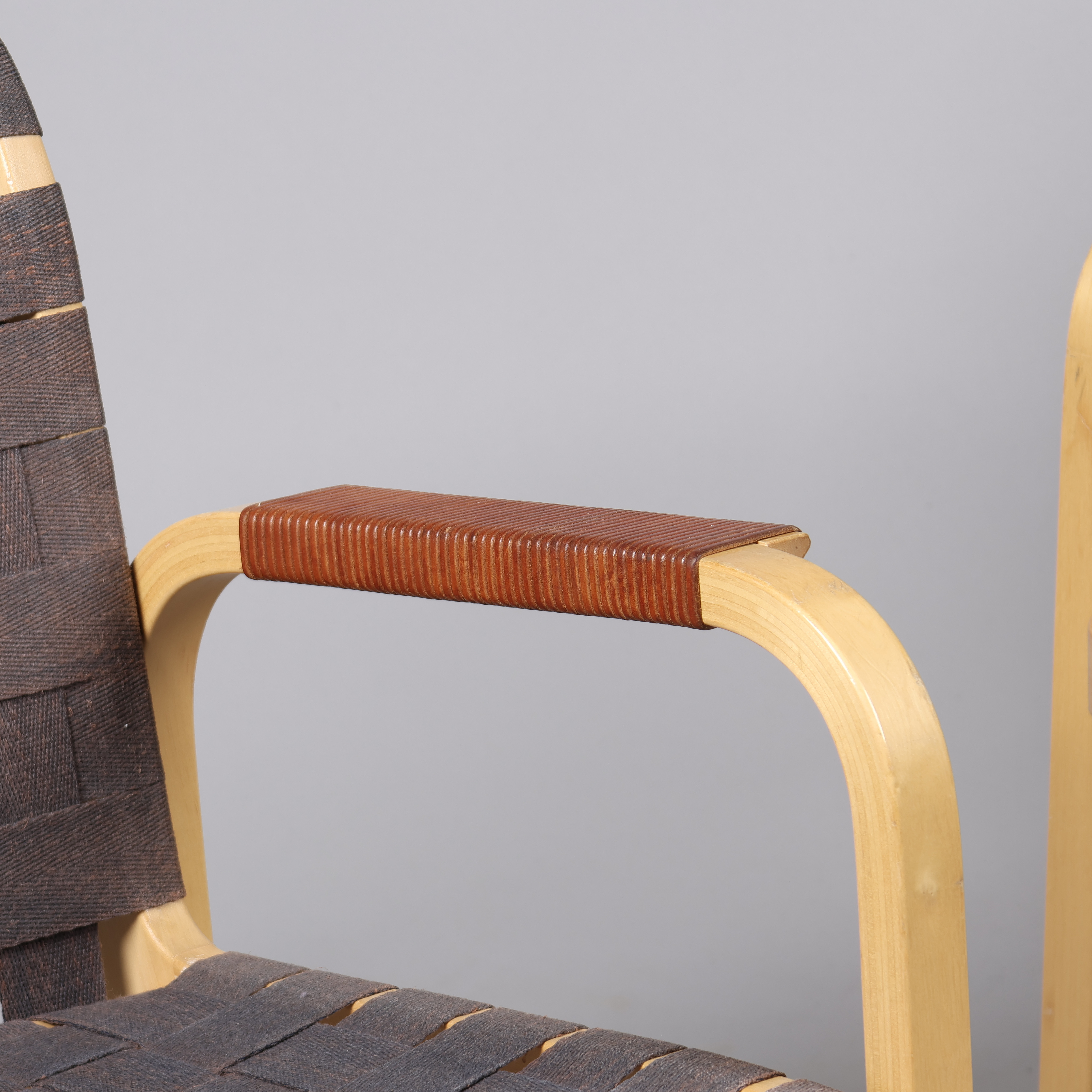Images for 4642394. ALVAR AALTO (1898-1976). A pair of moulded birch, made and leather chairs ...